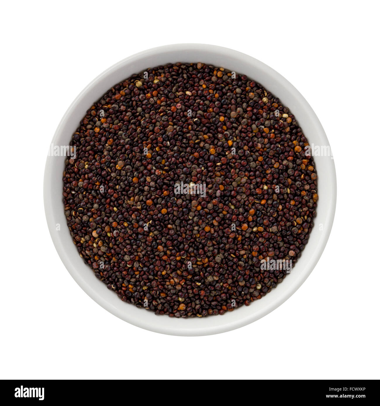 Black Quinoa in a white ceramic bowl. The image is a cut out, isolated ...