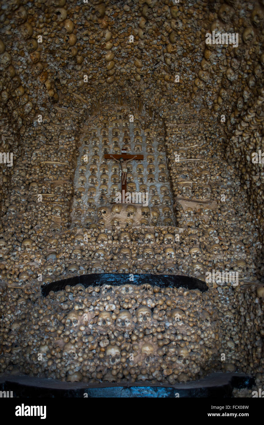 Human skulls on the walls of Chapel of the Deceased,Capela dos Ossos ...