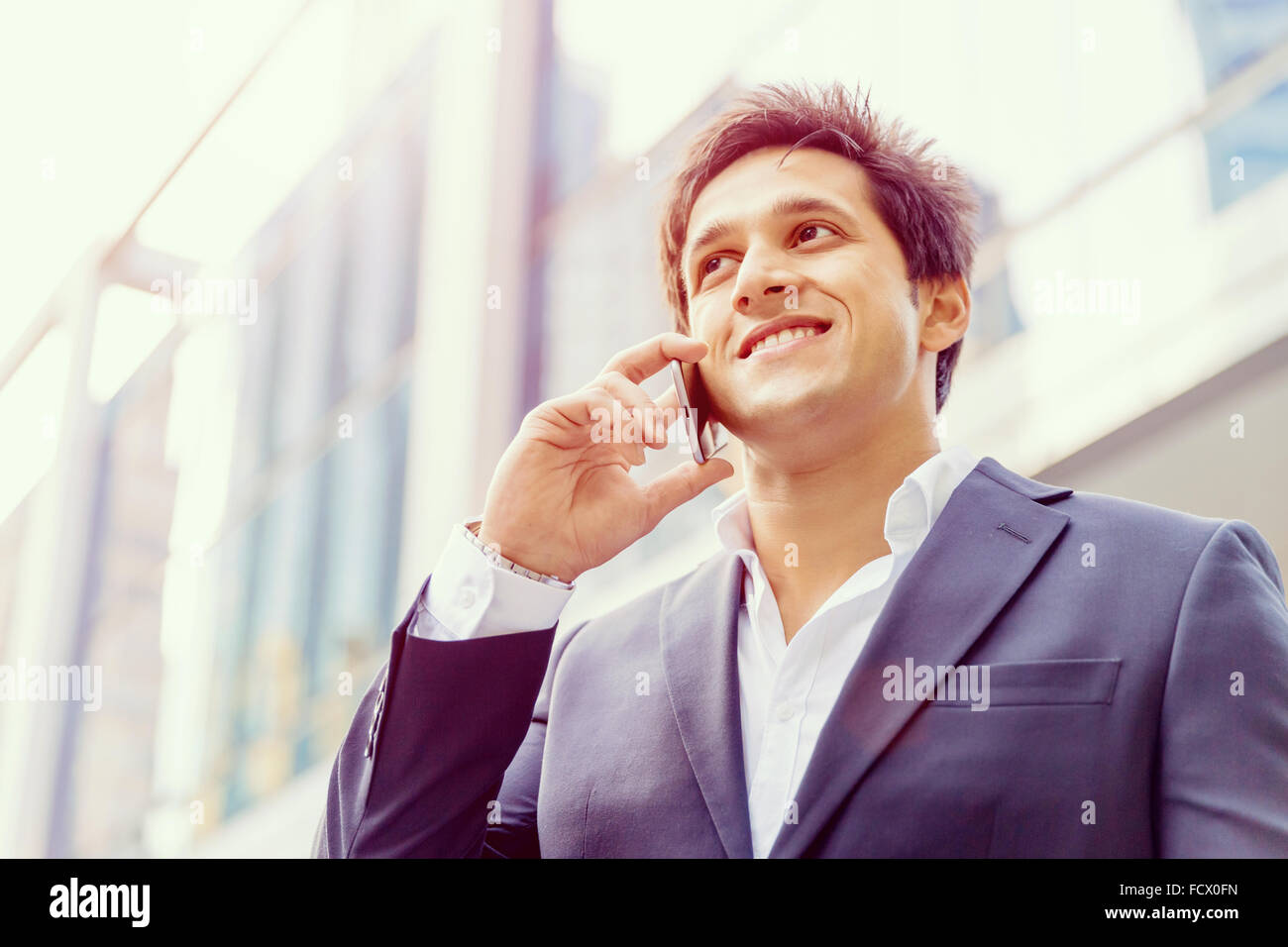 Portrait of confident businessman with his mobile phone outdoors Stock ...