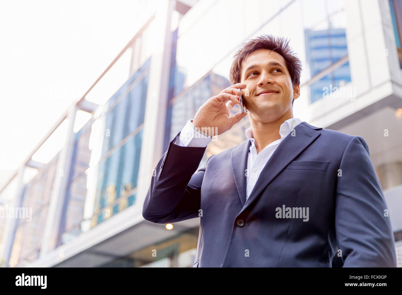 Portrait of confident businessman with his mobile phone outdoors Stock ...