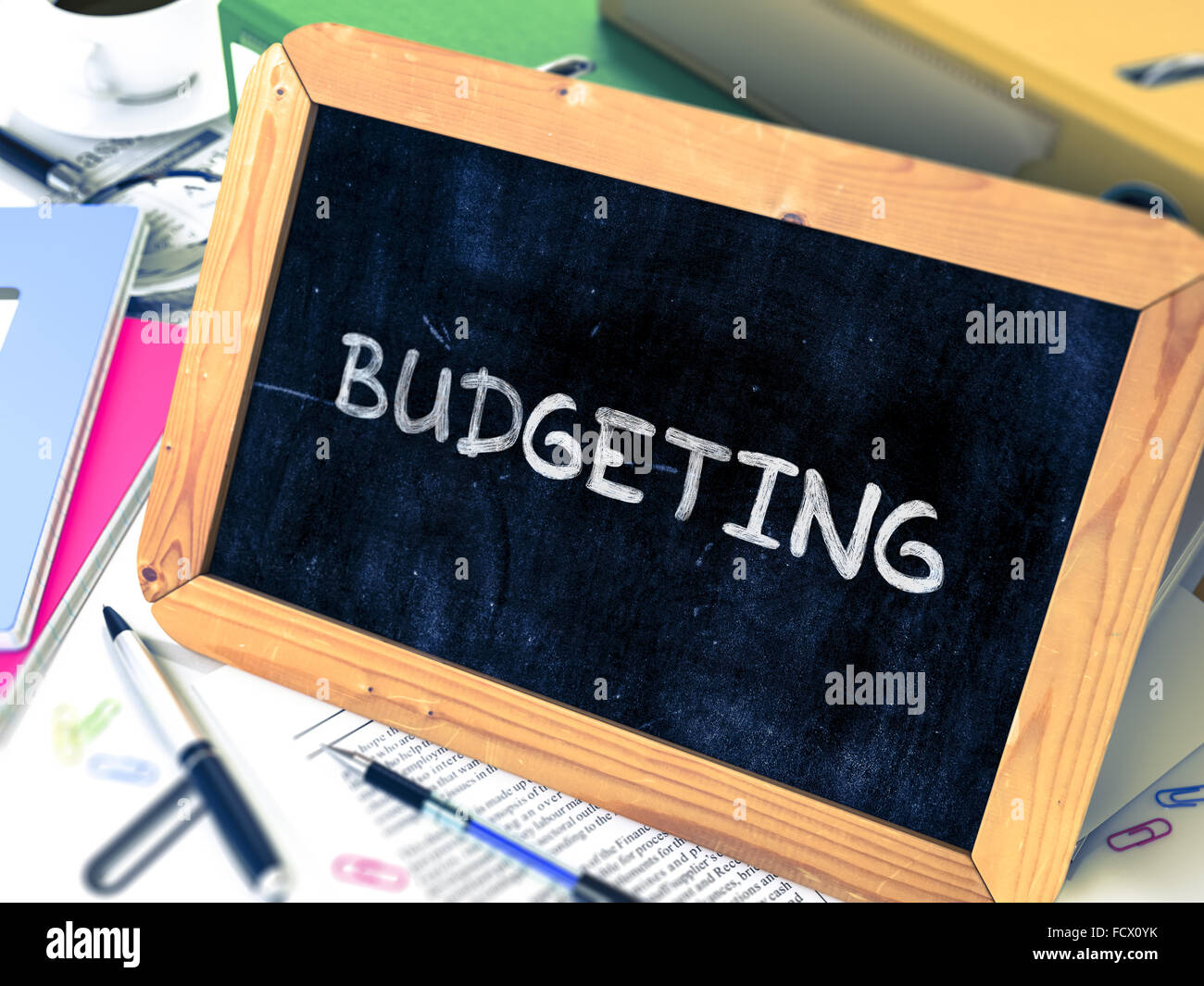 Budgeting Concept Hand Drawn on Chalkboard on Working Table Background ...