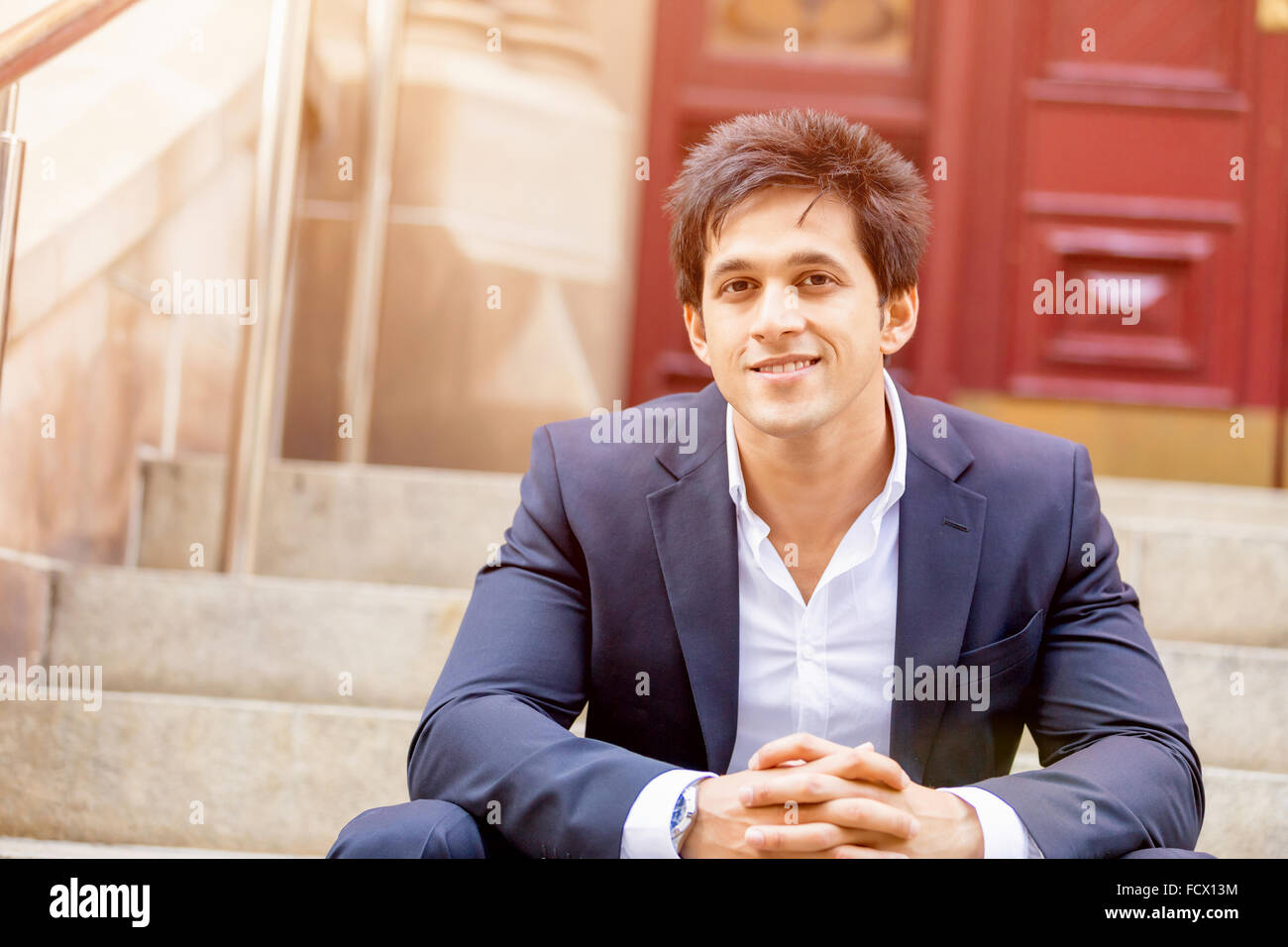 Portrait of confident businessman with his mobile phone outdoors Stock Photo - Alamy