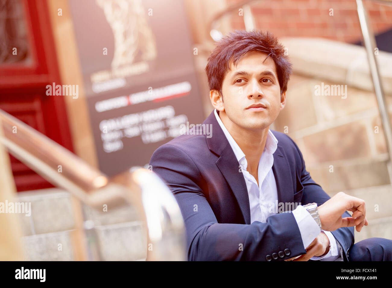 Portrait of confident businessman with his mobile phone outdoors Stock Photo - Alamy