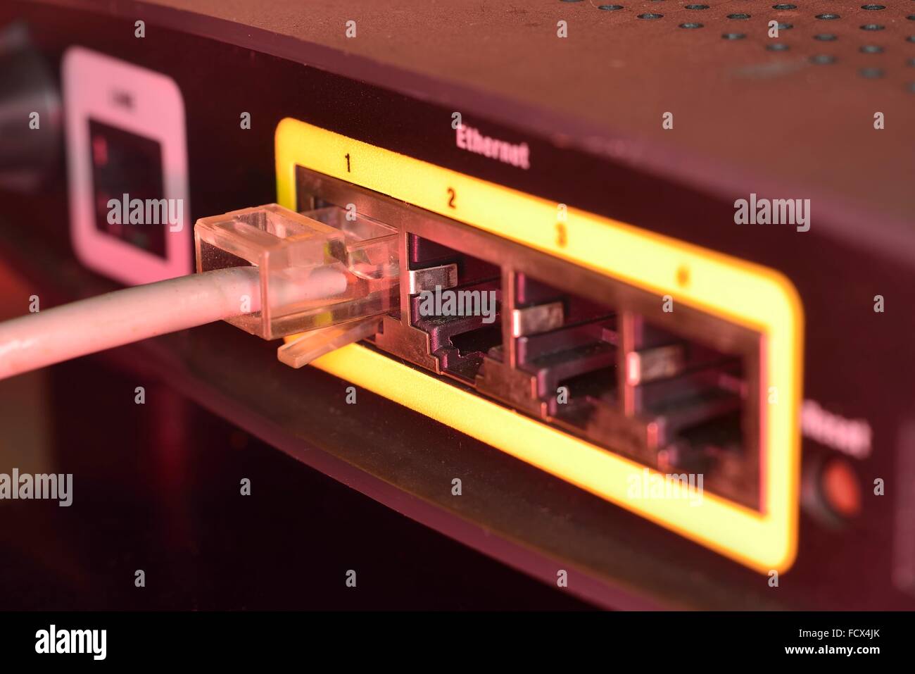 ethernet cable with rj45 connected to socket in router Stock Photo - Alamy