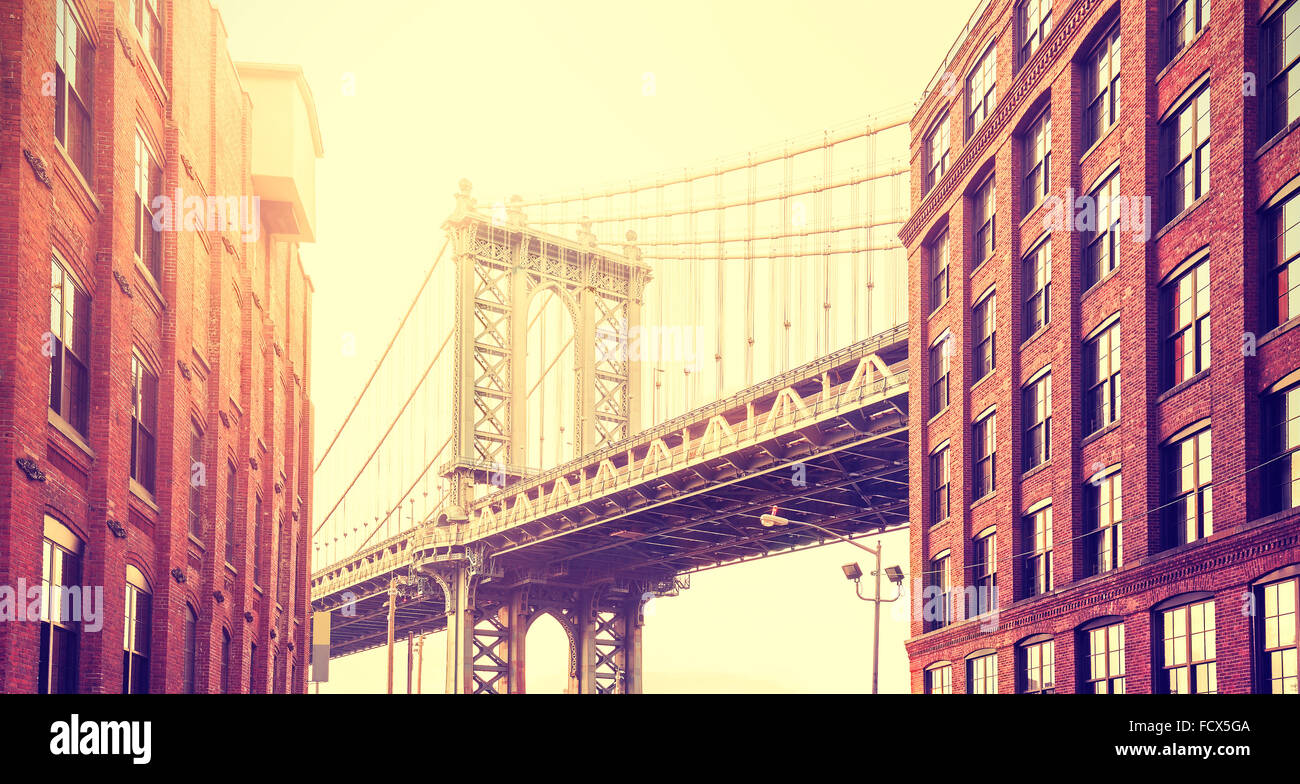 Vintage stylized Manhattan Bridge seen from Dumbo at sunset, New York ...