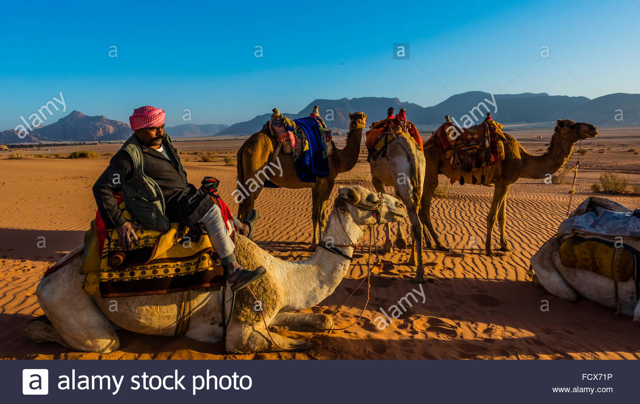People Riding Camel In Desert Camel Stock Photos & People Riding Camel ...