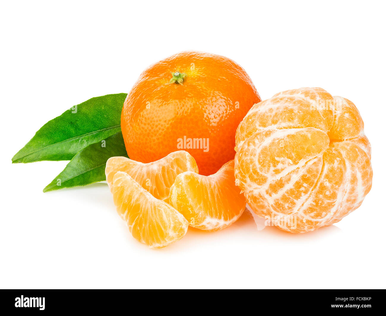 Ripe mandarin with leaves close-up on a white background. Tangerine ...