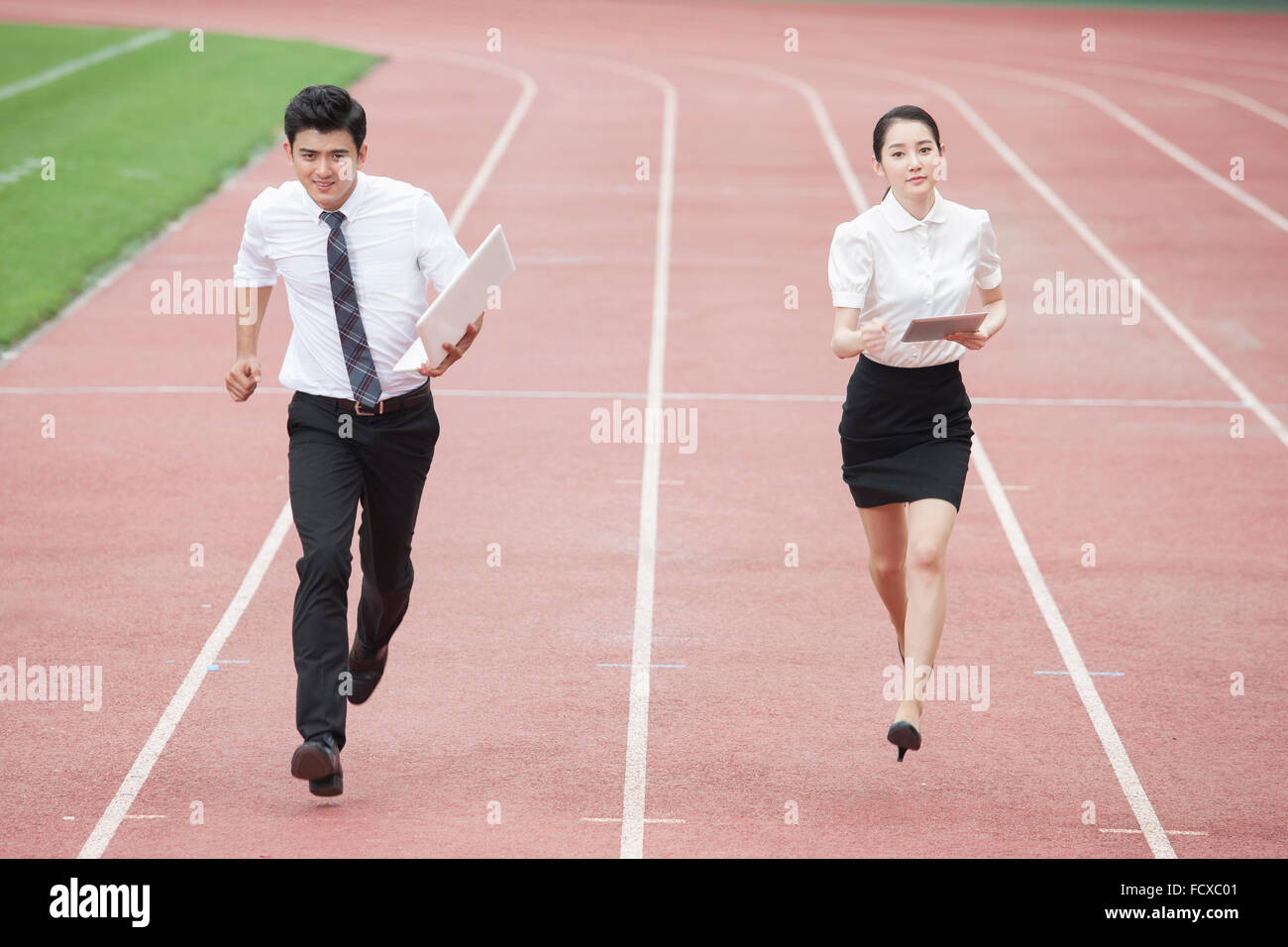 Man in suit running hi-res stock photography and images - Alamy