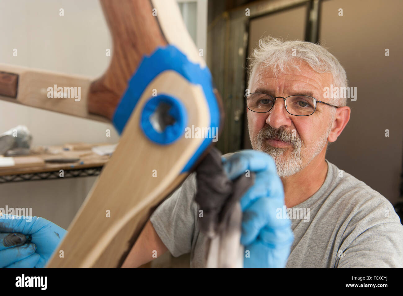 Skilled craftsmen create beautiful wooden frames from raw wood to ...