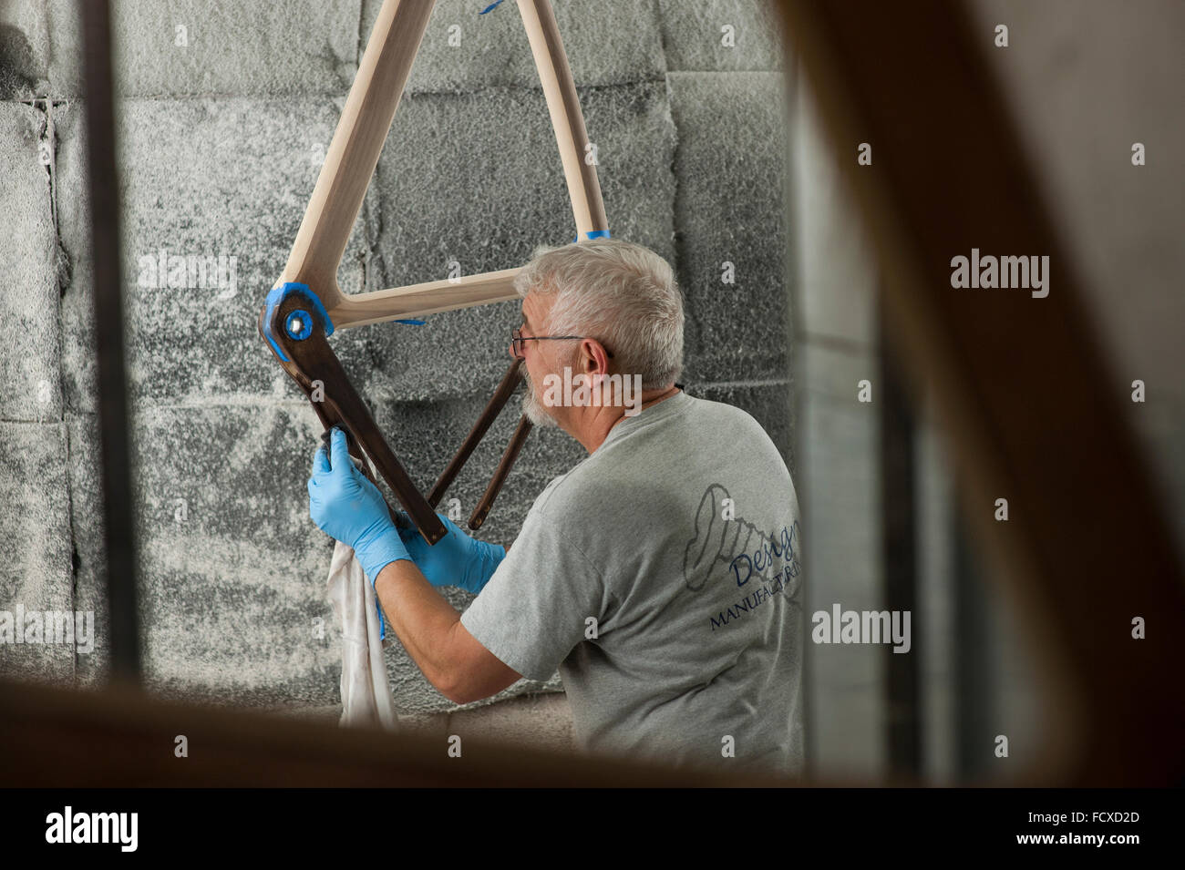 Skilled craftsmen create beautiful wooden frames from raw wood to ...