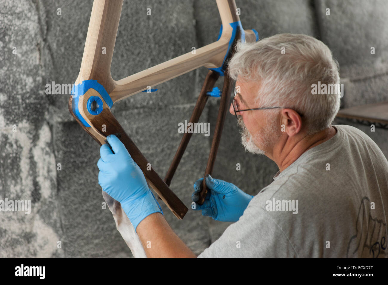 Skilled craftsmen create beautiful wooden frames from raw wood to ...