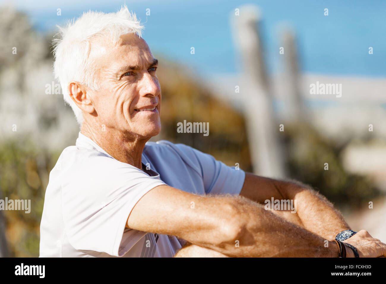Portrait of healthy senior man smiling at camera Stock Photo - Alamy