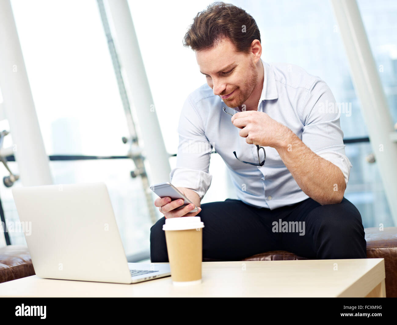 Checking looking reading texting message messages hi-res stock ...