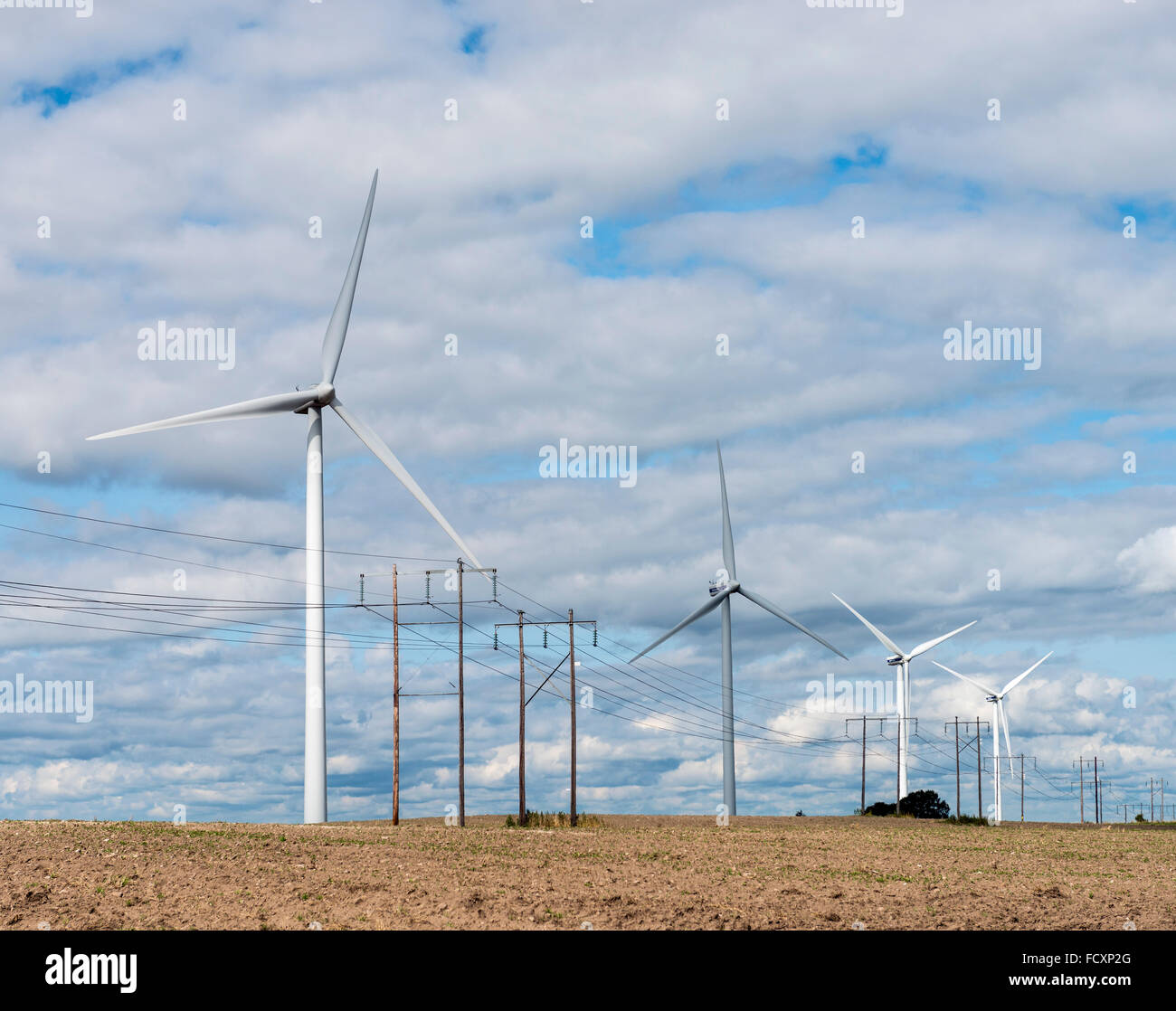 Wind turbines and power line Stock Photo - Alamy