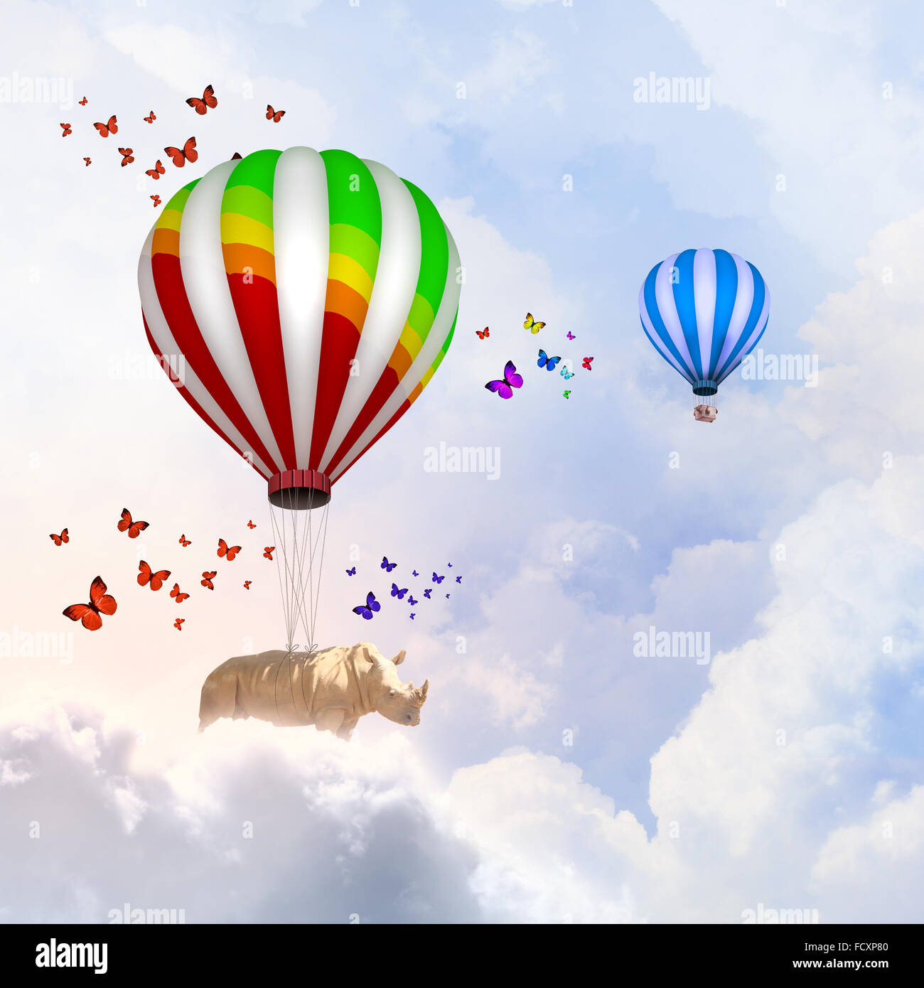 Sunny image of giraffe flying high in sky on aerostat Stock Photo - Alamy