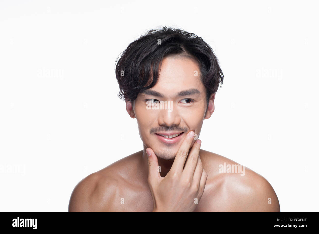 Touching his mustache hi-res stock photography and images - Alamy