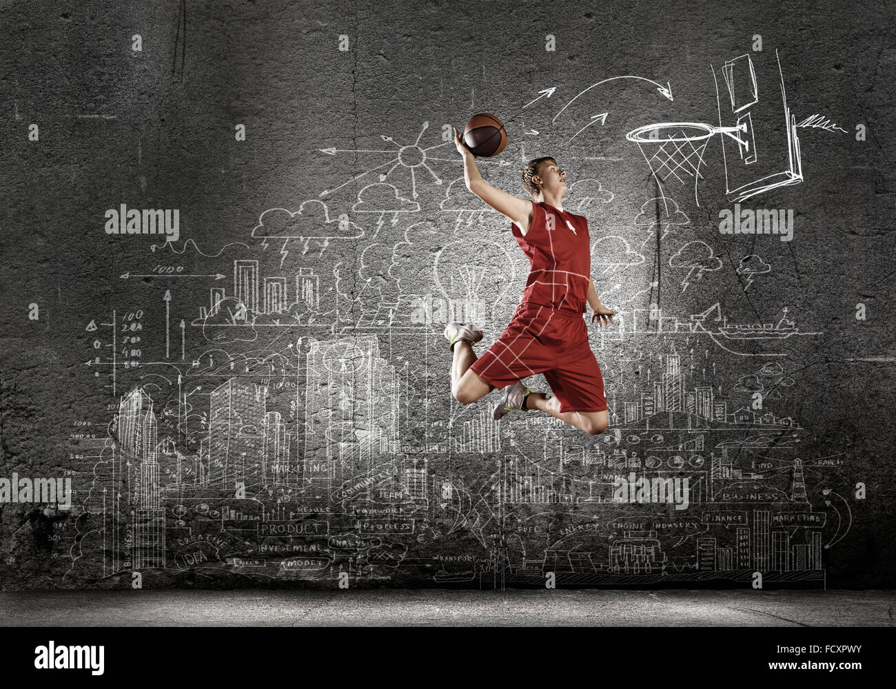Young man basketball player with ball in hands jumping high Stock Photo ...