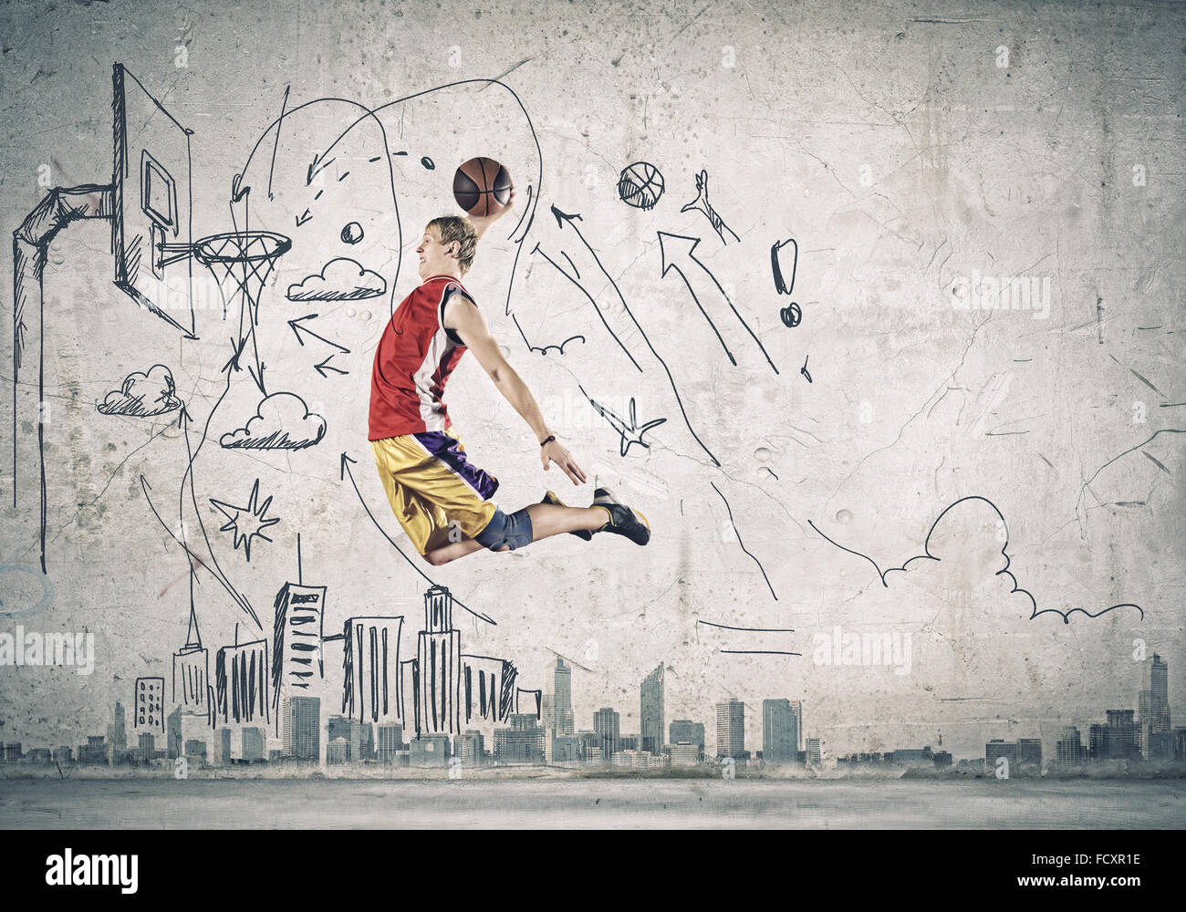 Young man basketball player throwing ball in basket Stock Photo - Alamy