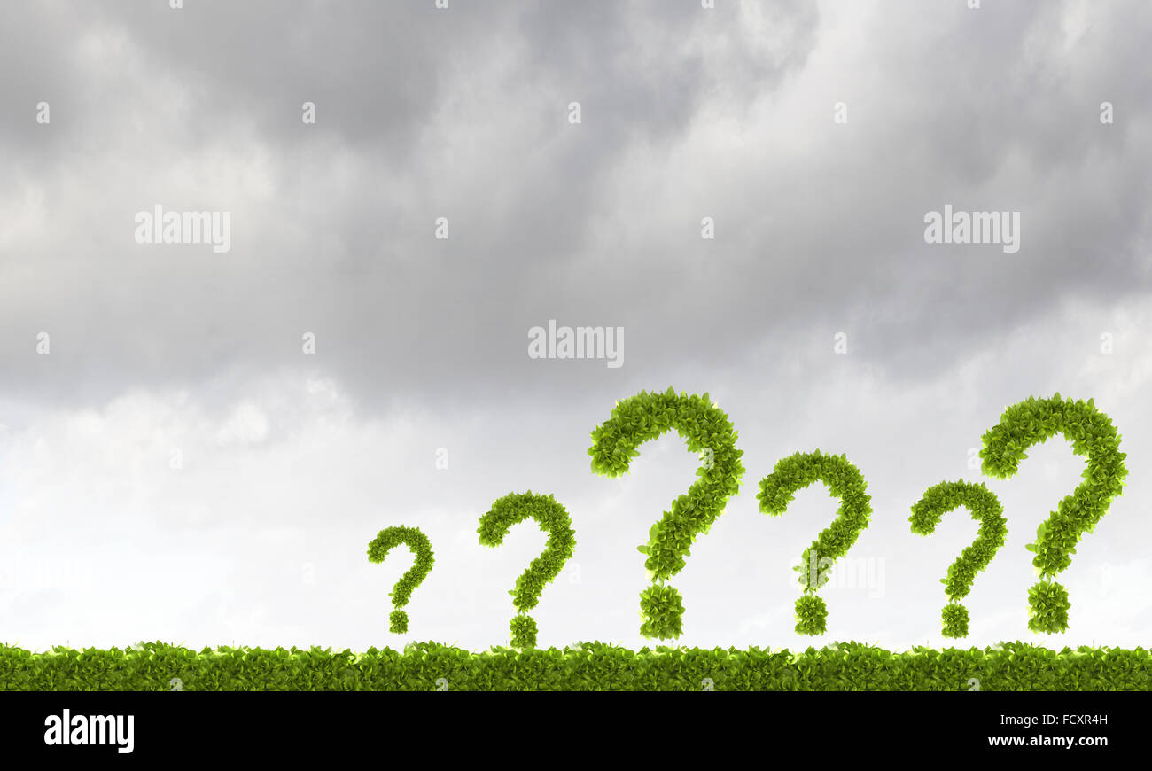 Conceptual image of plant in pot shaped like question mark Stock Photo ...