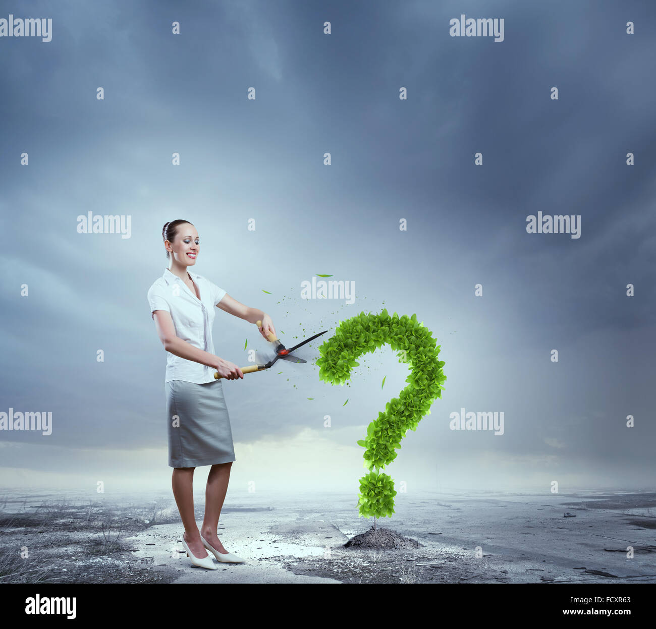 Conceptual image of green plant shaped like question mark Stock Photo ...