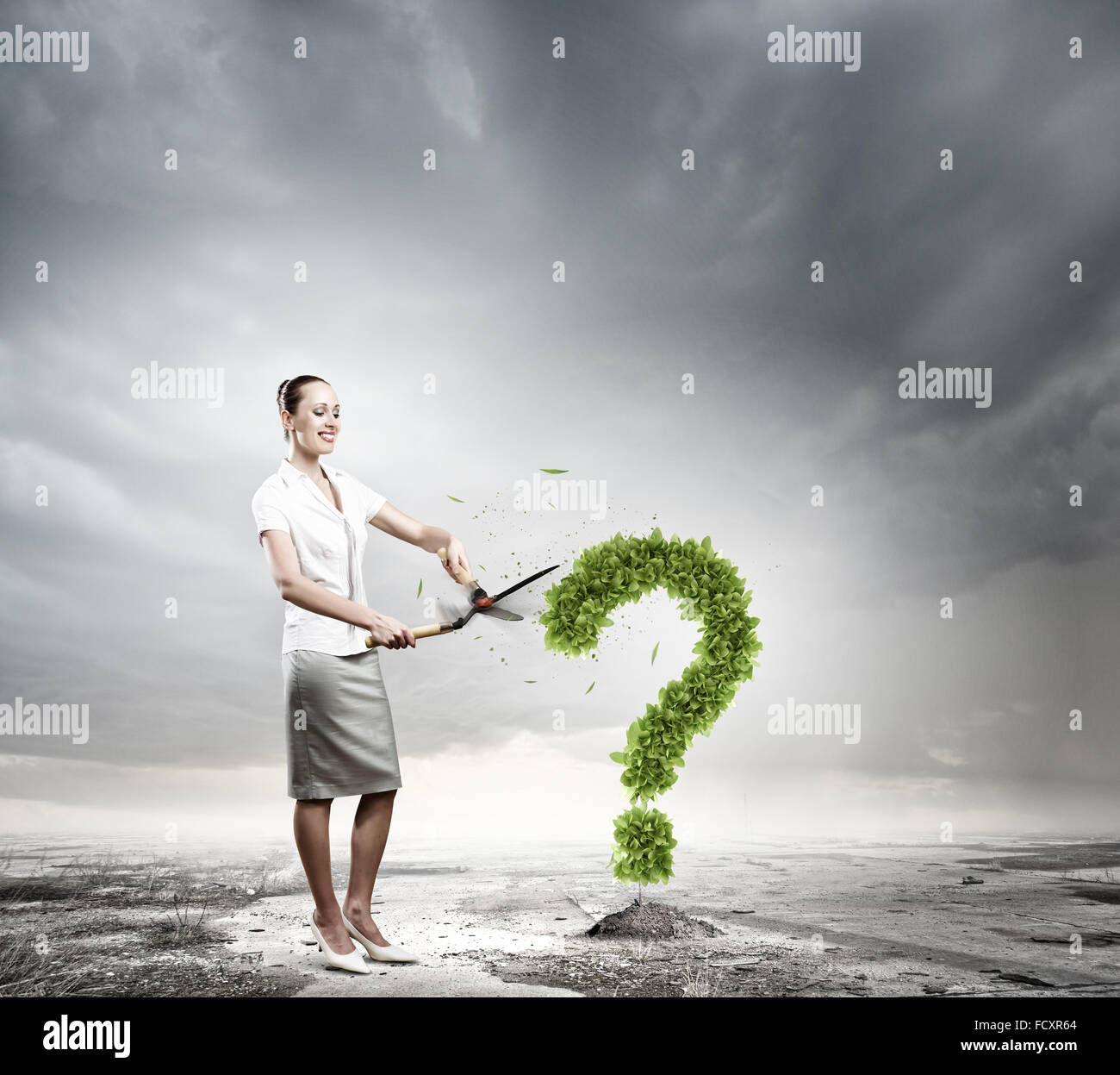 Conceptual image of green plant shaped like question mark Stock Photo ...