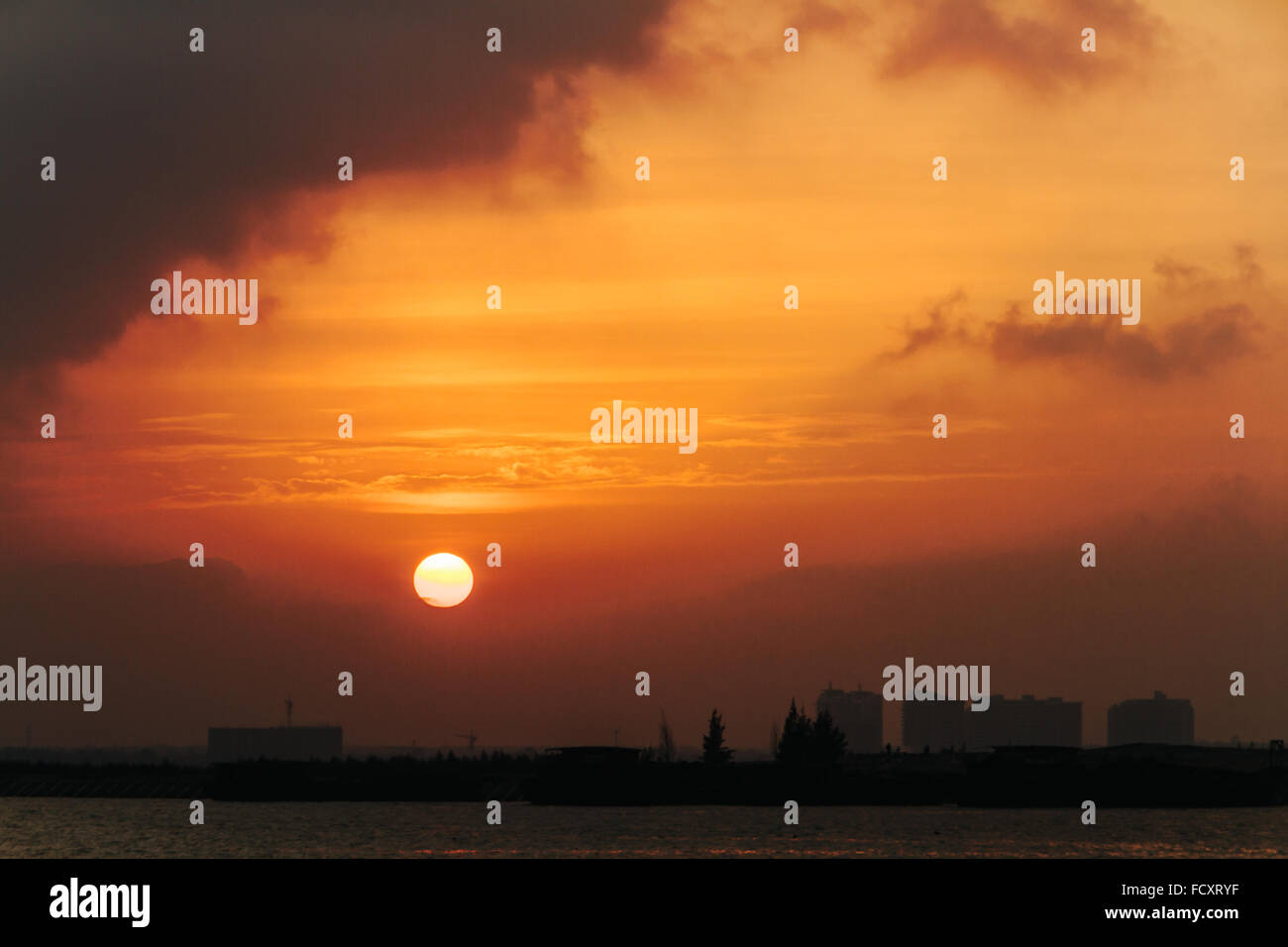 Hainan, China - The beautiful sunset view at sea beach Stock Photo - Alamy
