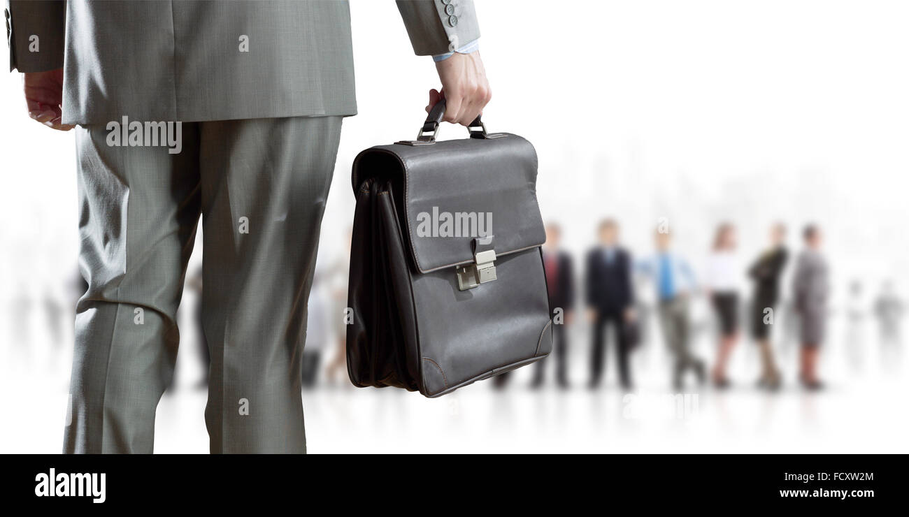 Back view of confident businessman with business team at background ...