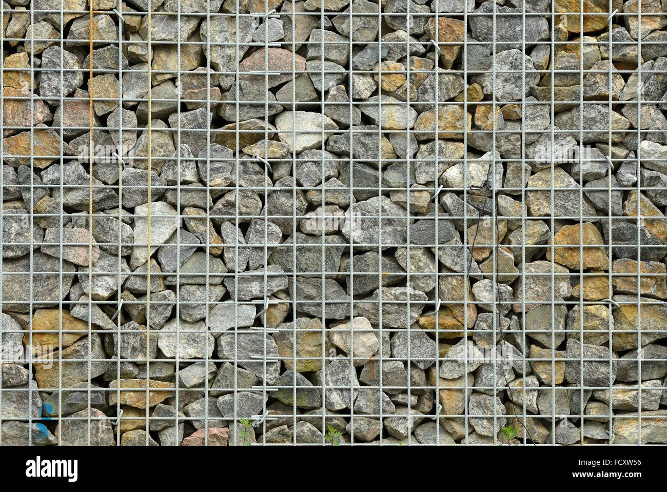 Stone and steel grille Stock Photo - Alamy