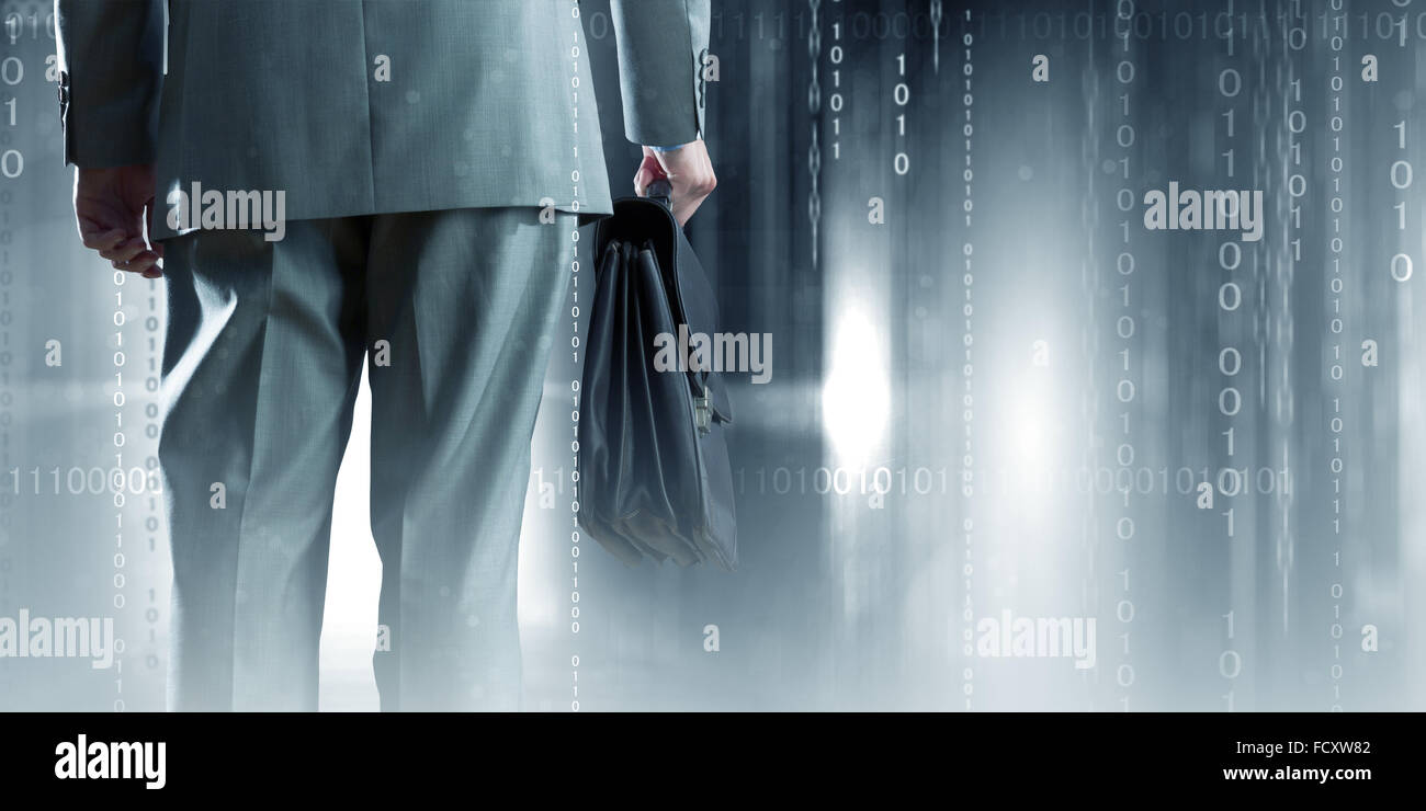 Bottom view of confident businessman against media background Stock ...