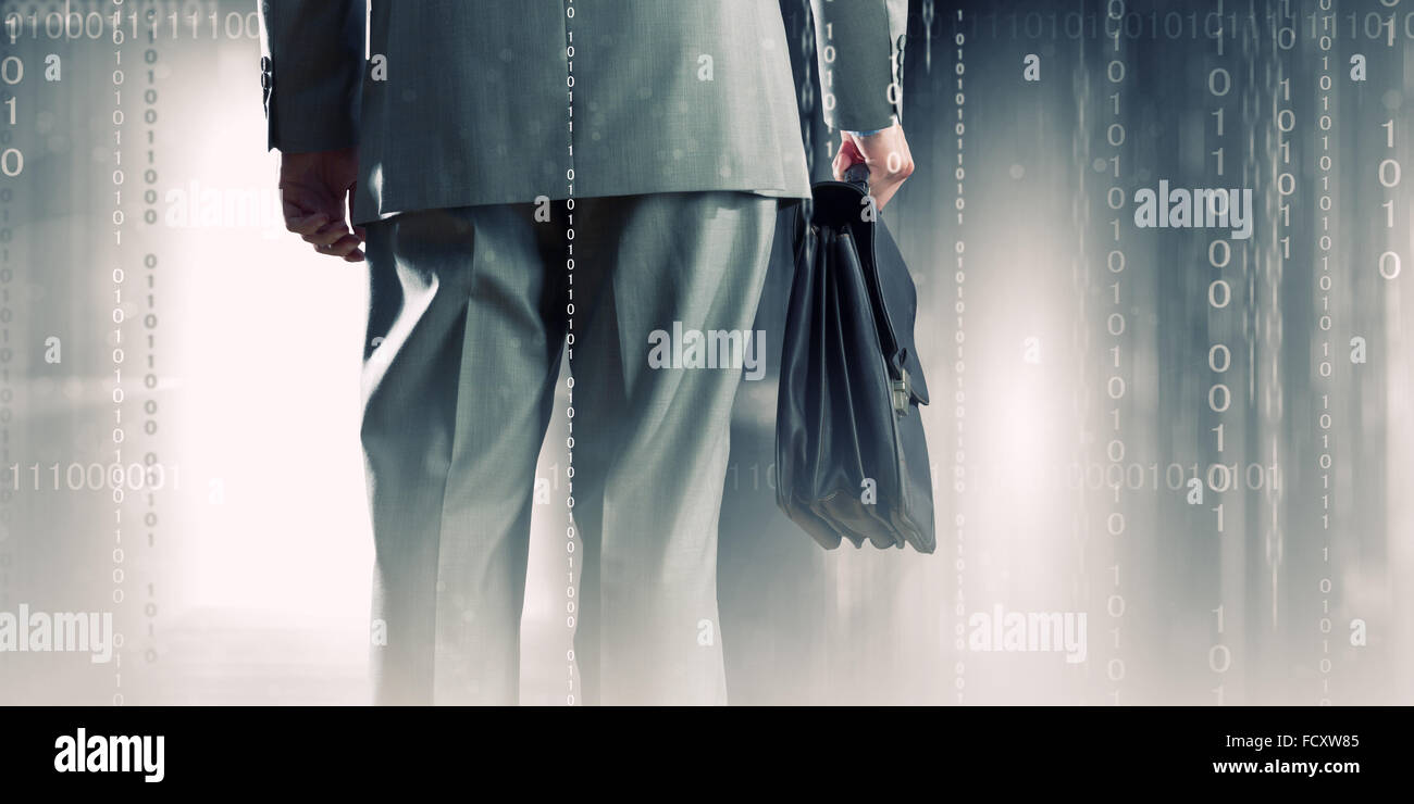 Bottom view of confident businessman against media background Stock ...