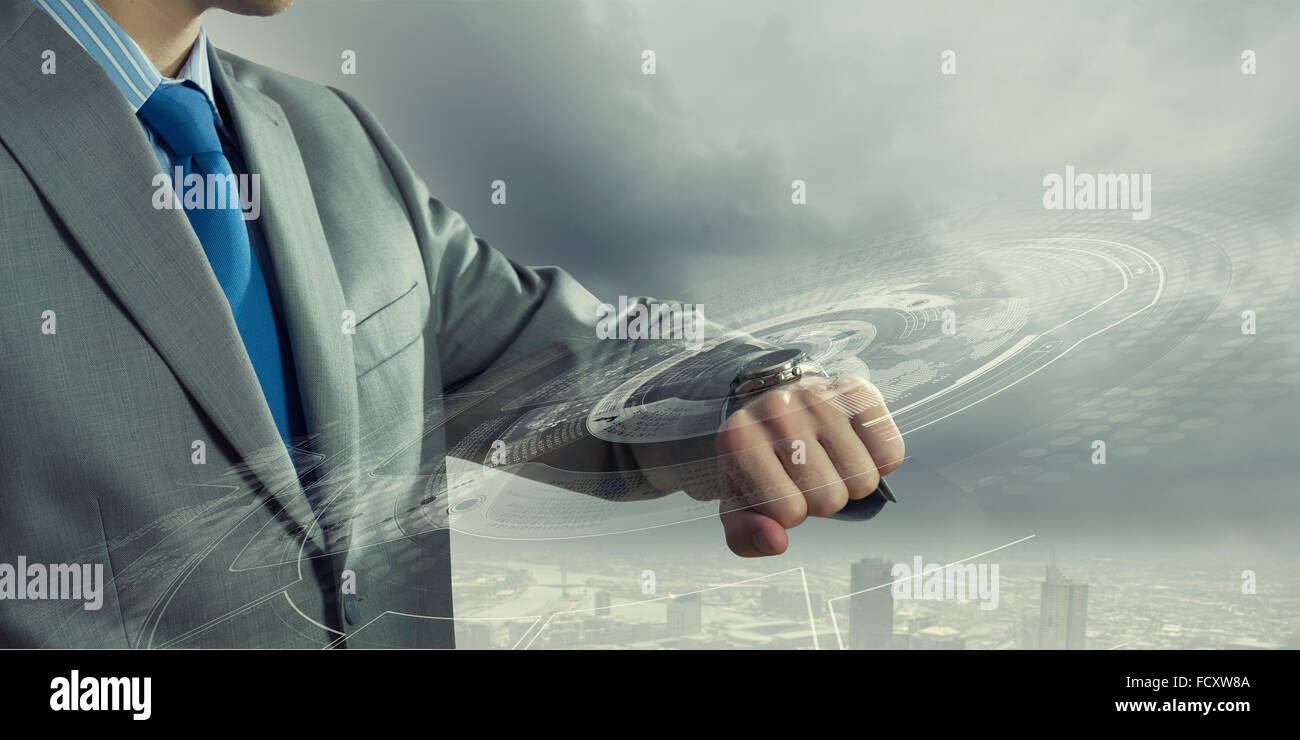 Close up of businessman looking at watch Stock Photo - Alamy