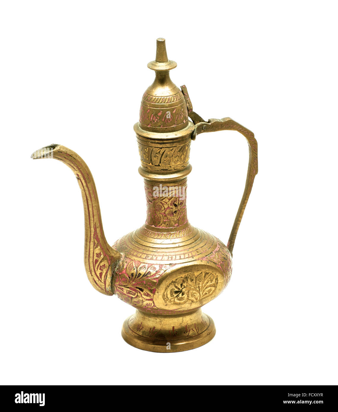 Old golden metallic kettle with ethnic ornaments Stock Photo - Alamy