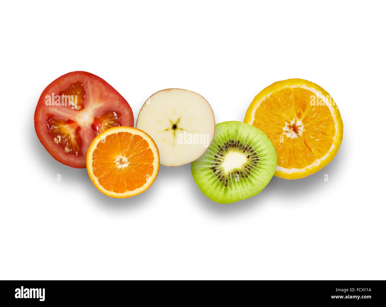Halves of juicy fruits against white background Stock Photo - Alamy