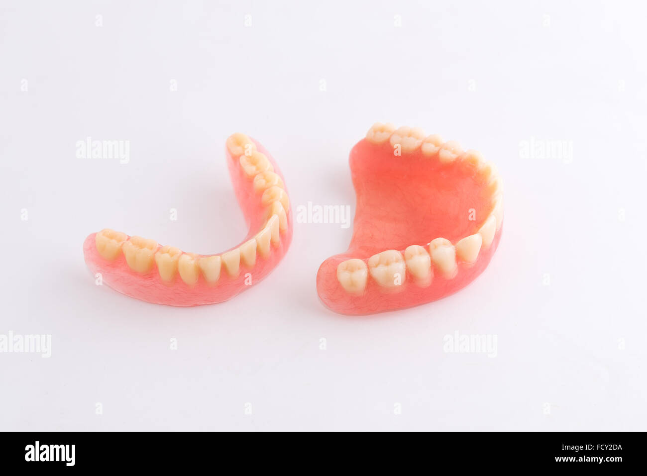 full denture on white background Stock Photo - Alamy