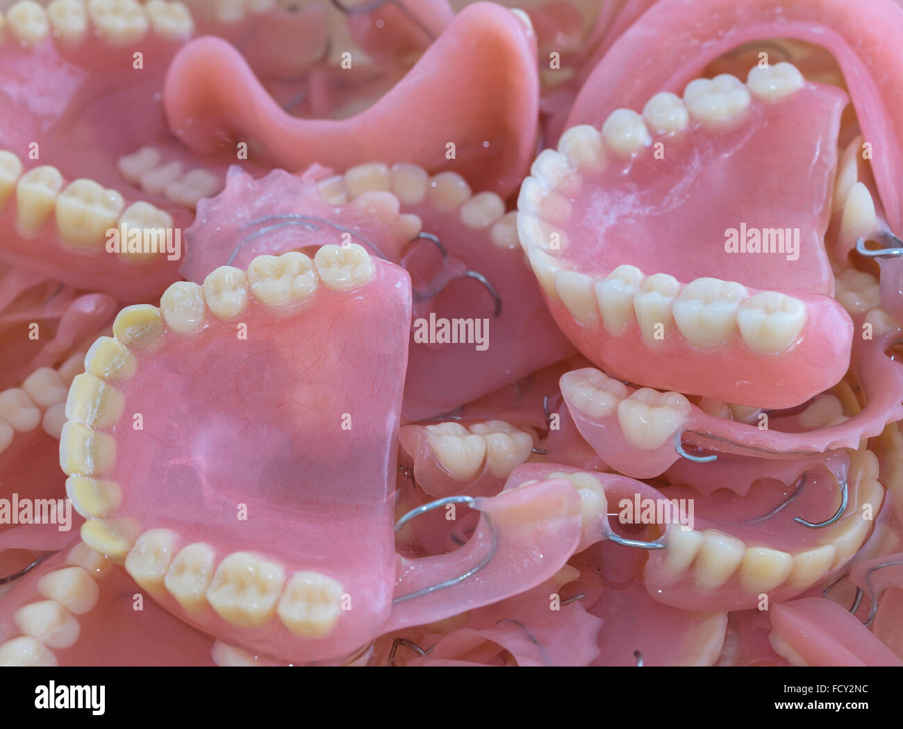 Old dentures background Stock Photo - Alamy