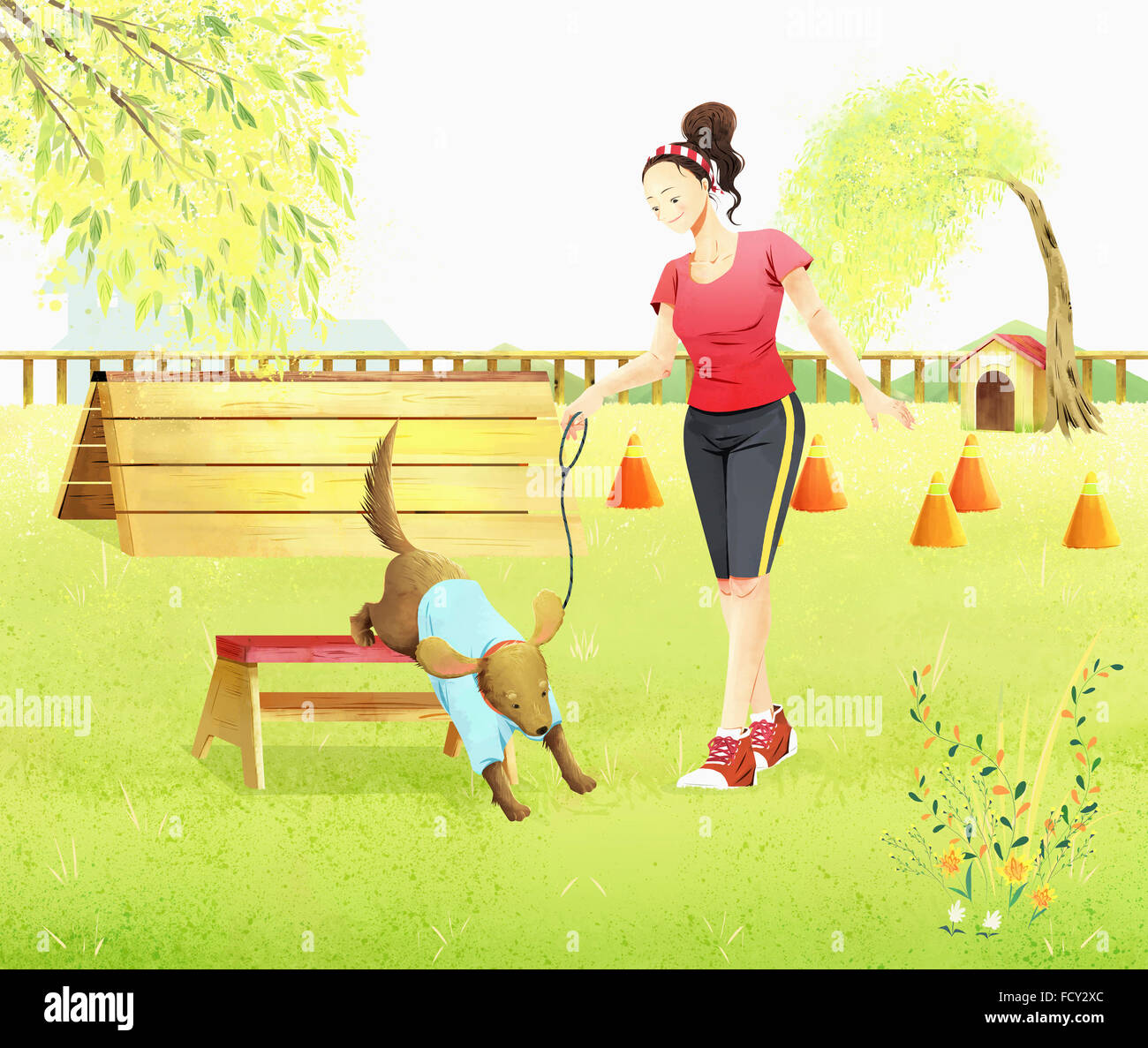 Dog being trained by his owner outside Stock Photo - Alamy