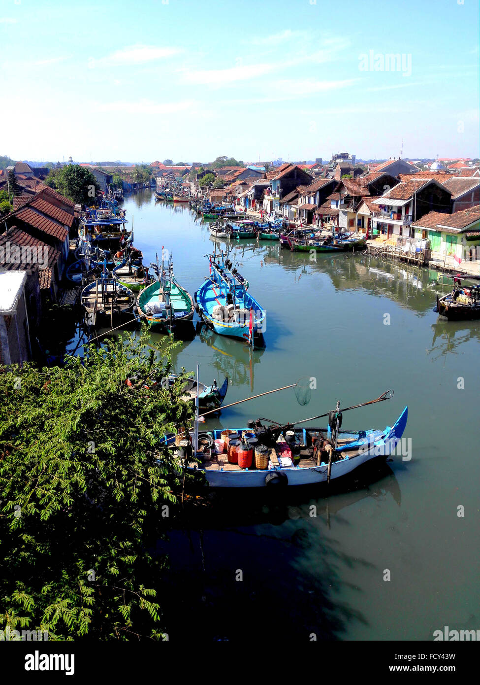 Indonesia Central Java Jepara Fishing boats moored on the river Adrian ...