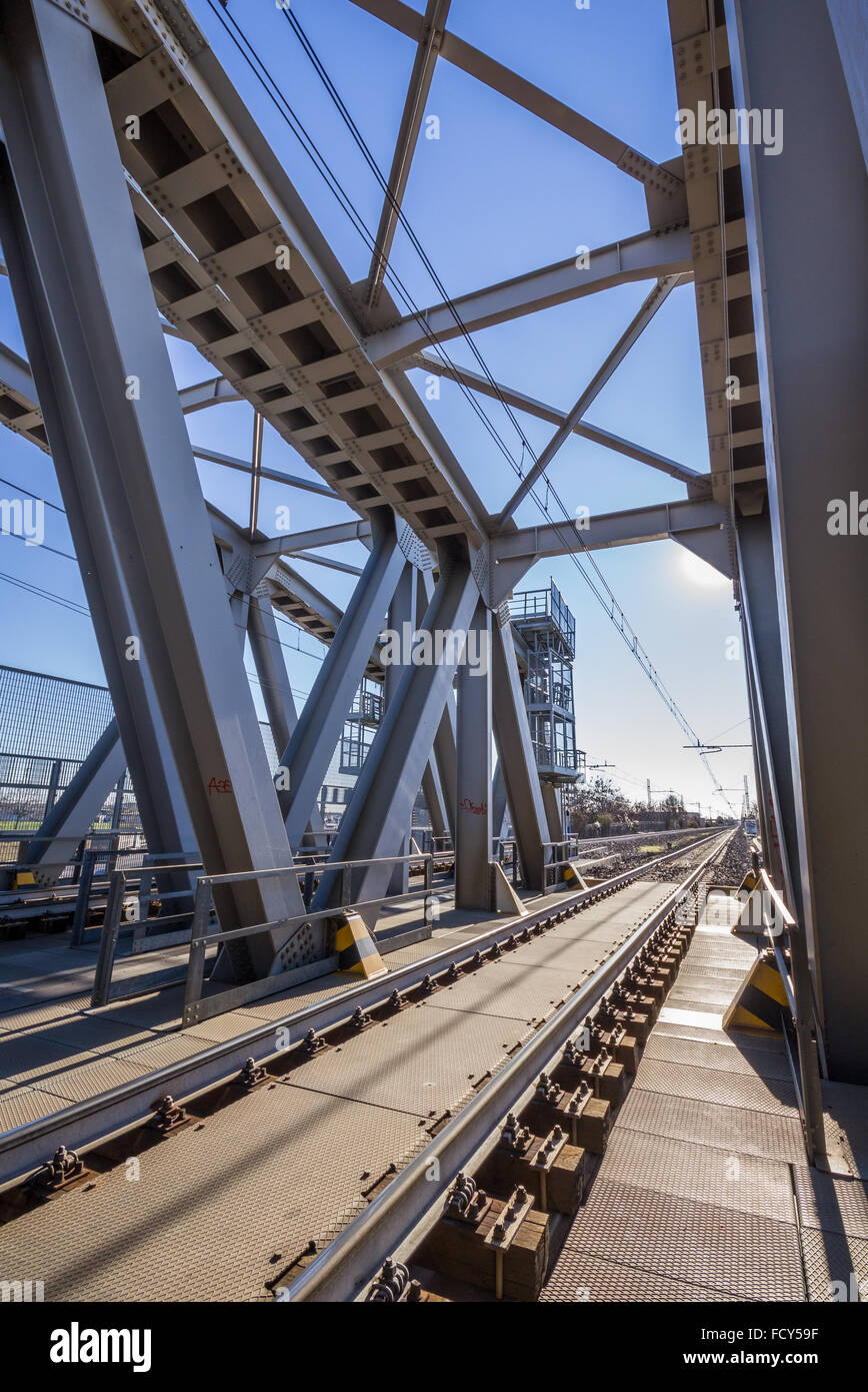Modern railway steel bridge over highway Stock Photo - Alamy