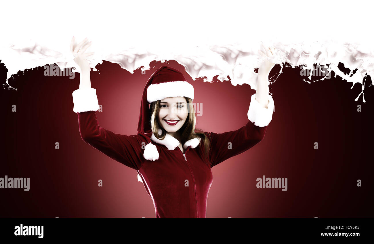 Girl in Santa costume with white blank banner. Place for text Stock ...