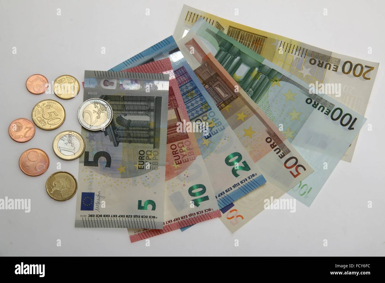 New Euro banknotes and coins Stock Photo - Alamy