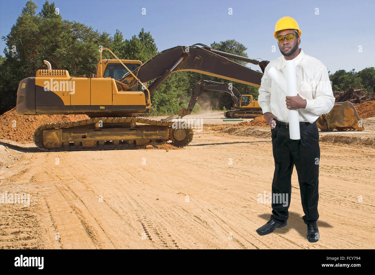 Balck African American male construction worker a job site with a ...