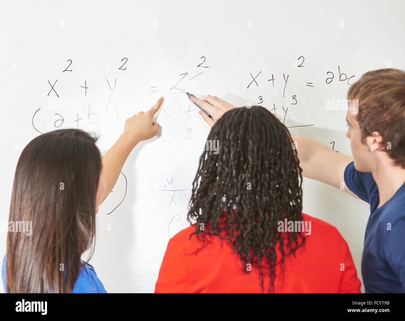 Students in class solveing a math problem together Stock Photo - Alamy