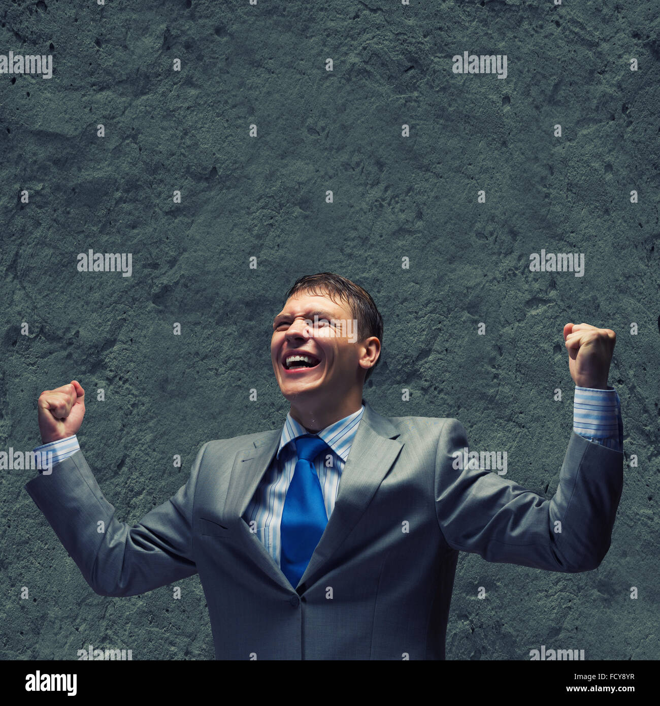 Successful businessman screaming joyfully in to sky Stock Photo - Alamy