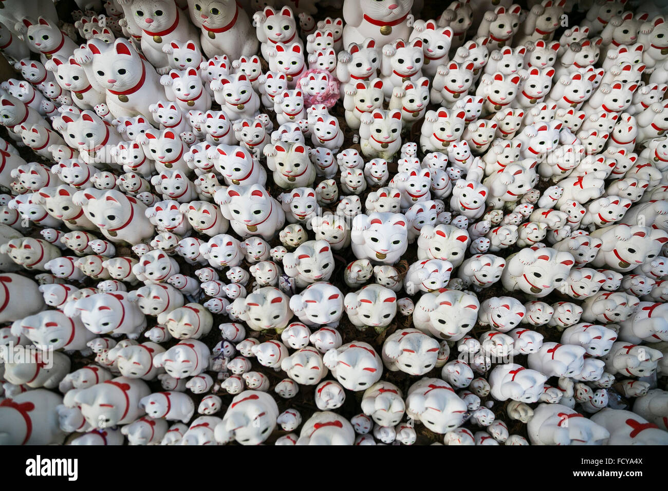 Tokyo, Japan. 26th January, 2016. Thousands of Maneki-Neko figurines on display at Goutoku ...