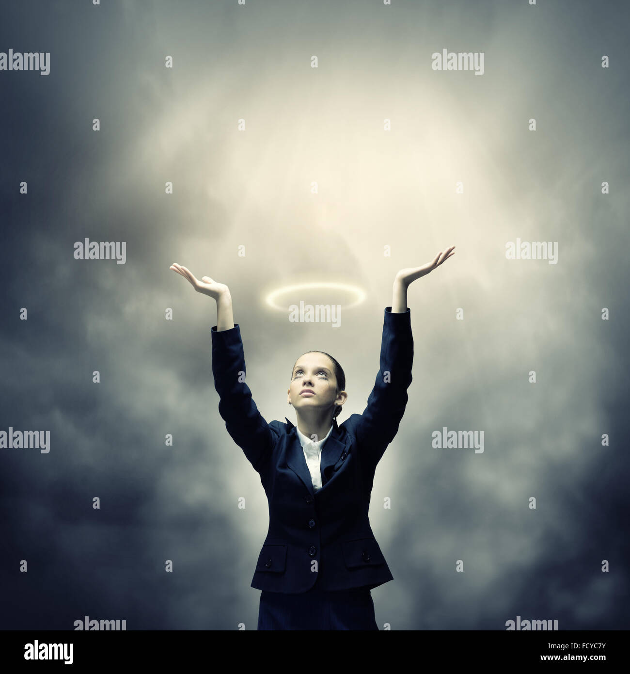 Young crying businesswoman with halo above head Stock Photo - Alamy