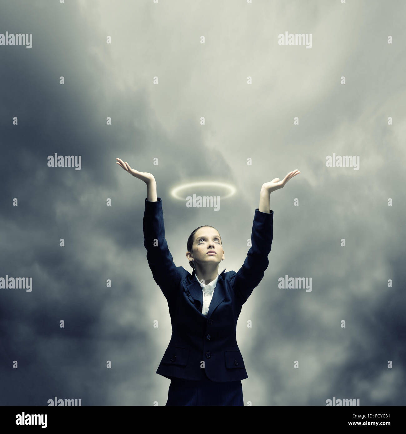 Young crying businesswoman with halo above head Stock Photo - Alamy