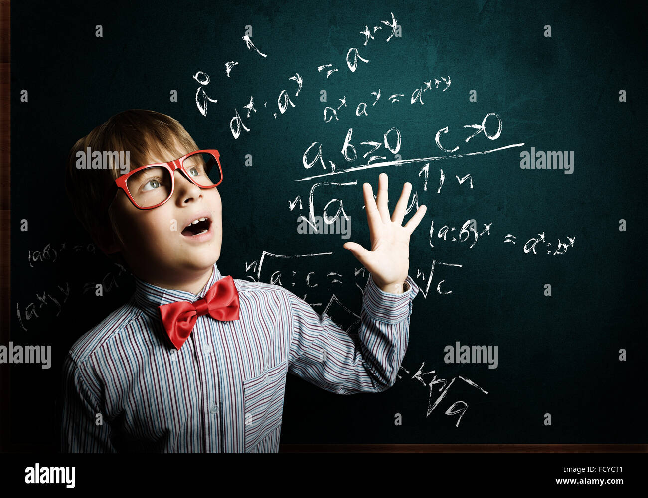 Boy solve maths board hi-res stock photography and images - Alamy