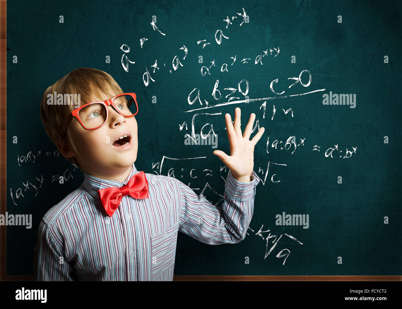 Boy solve maths board hi-res stock photography and images - Alamy