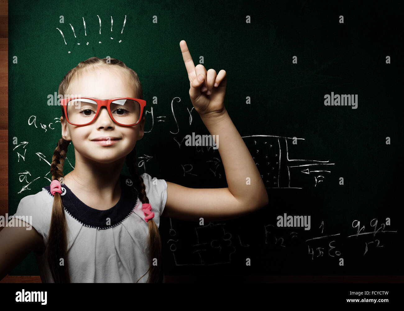 Genius girl in red glasses near blackboard with formulas Stock Photo ...