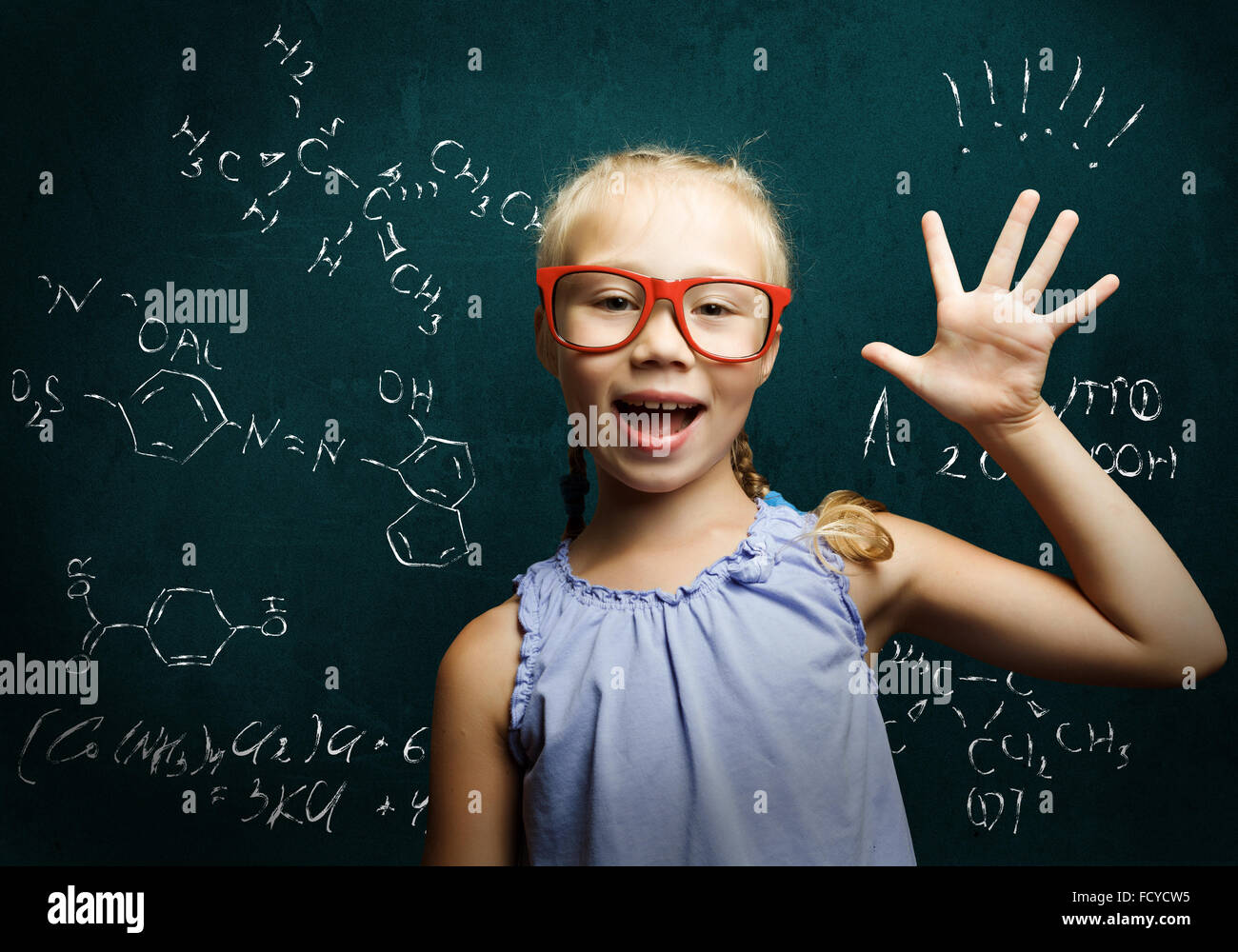 Genius girl in red glasses near blackboard with formulas Stock Photo ...